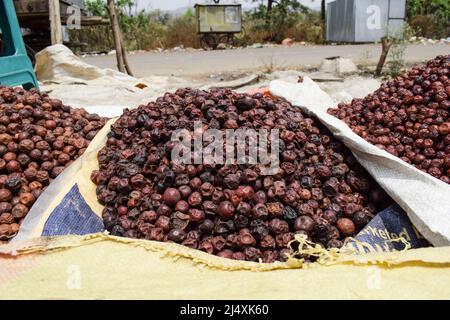 Indian dried jujube jungli Ber sold in Vegetable market. Bora or Ber ...