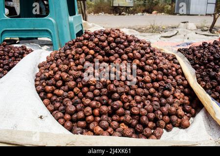 Indian dried jujube jungli Ber sold in Vegetable market. Bora or Ber ...