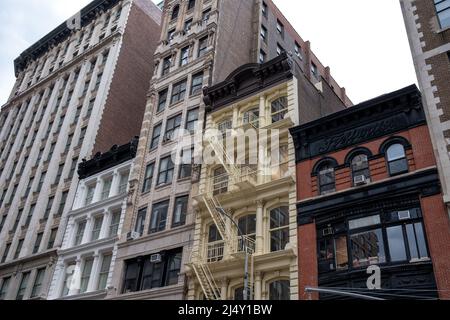 classic stone and brick building facades on Broadway, New York City ...