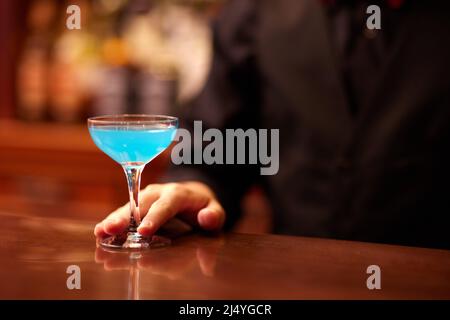 Japanese bartender serving a drink Stock Photo - Alamy