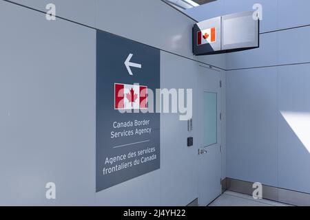 A Canada Border Services Agency officer and CBSA narcotics detection ...