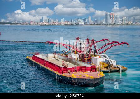 Dredging barges working off the coast of Miami Beach seen from a cruise ...