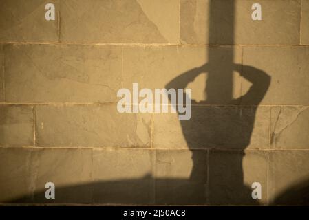 Young female health related poses with shadows Stock Photo - Alamy