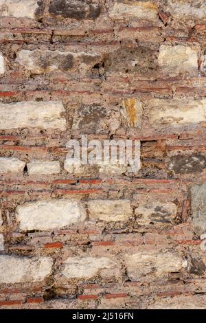 The rough masonry of large blocks of an ancient structure, like a ...