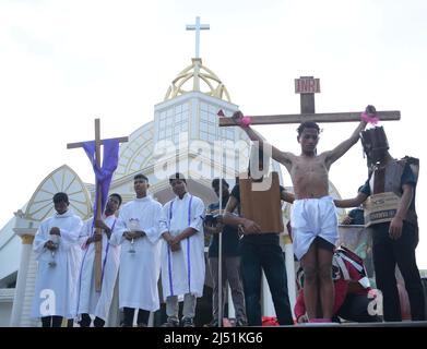 Indian Christian people take part in prayer and religious procession on ...