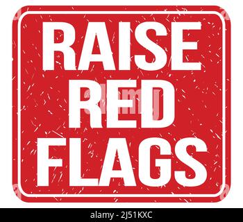 RAISE RED FLAGS text written on red zig-zag stamp sign Stock Photo - Alamy