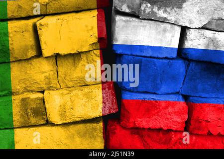 Russia and Mali two flags on flagpoles and blue cloudy sky Stock Photo ...