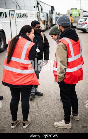 LVIV, UKRAINE - APRIL 18, 2022 - Rescuers remove debris after a Russian missile strike at an ...