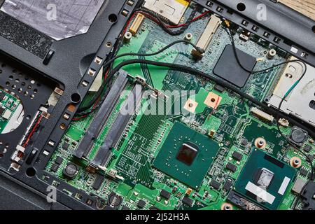 Circuit board closeup, laptop interiors Stock Photo - Alamy