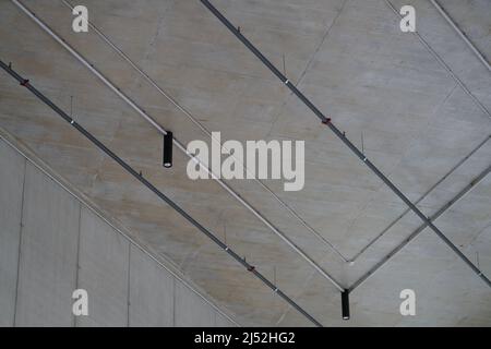 Electric cable corrugated on the ceiling. Cable laying ceiling Stock ...
