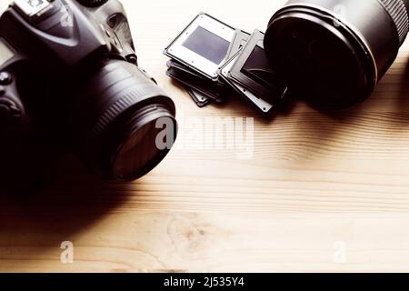 Camera lens and photographic slides for film projector Stock Photo - Alamy