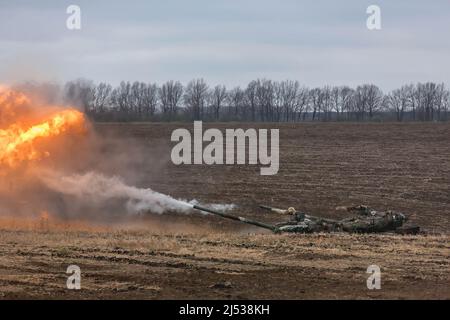 Armored units on combat duty. The tank man prepares the tank for ...
