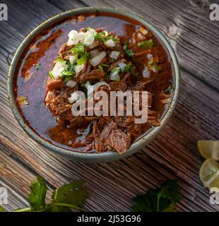 lemons for meat dish in its juice with corn tortilla chips, glass with ...