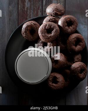 Baby food and milk on wooden table Stock Photo - Alamy