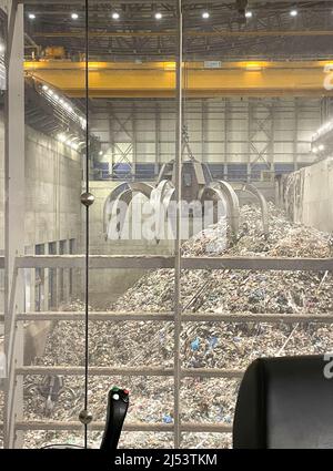Interior of a waste management facility combusts wastes to produce ...