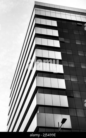Rectilinear and geometric facade with glass windows Stock Photo - Alamy
