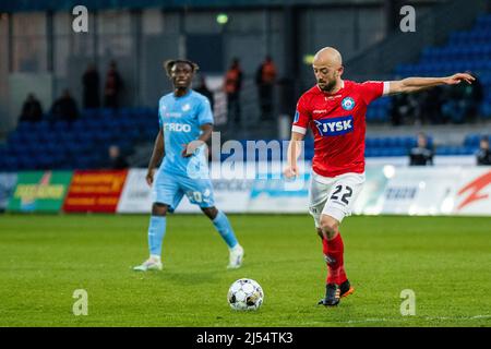 Randers, Denmark. 19th Apr, 2022. The players from the two teams greet ...