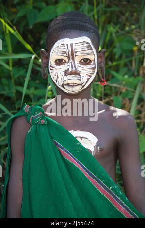 Surma girl with body paintings and distorted ears, Kibish, Omo River ...