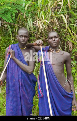 Two Surma men with scarification, Tulgit, Omo River Valley, Ethiopia ...