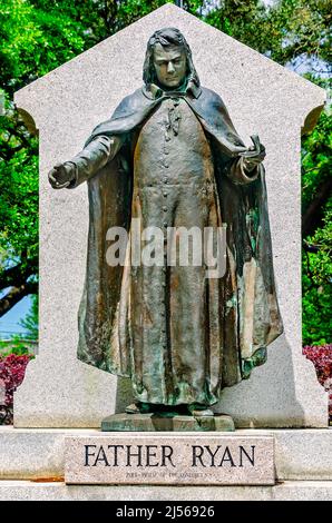 A statue of Father Ryan stands in Ryan Park, April 15, 2022, in Mobile ...
