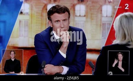 French President Emmanuel Macron (right) gestures next to U.S ...