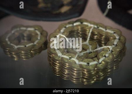 Traditional Balinese coins with hollow known as "pis bolong/jinah ...