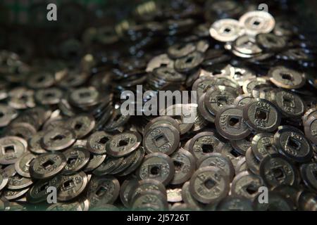 Traditional Balinese coins with hollow known as "pis bolong/jinah ...