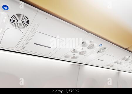 Overhead panel passenger service unit in an aircraft Stock Photo - Alamy
