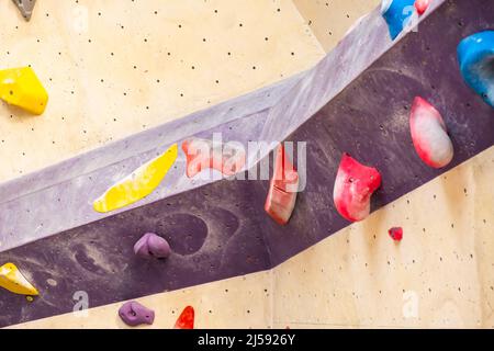 Stone hook on the artificial climbing wall in bouldering gym Stock ...