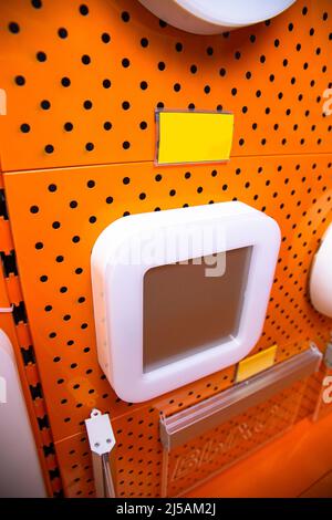 square led lamp on the orange showcase Stock Photo - Alamy