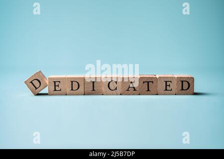 Devoted Dedicated Word Message Stock Photo - Alamy