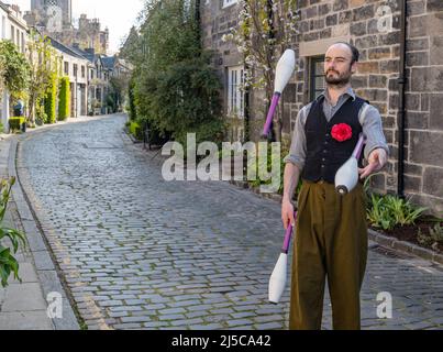 Circus act juggler, Robert Gallagher-Lyall practising juggling clubs ...