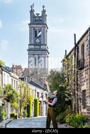 Circus act juggler, Robert Gallagher-Lyall practising juggling clubs ...