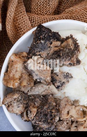Mogodu, a Traditional South African stew made of chopped innards of a ...