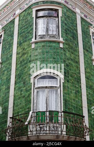 Cast Iron window grating with green wall Stock Photo - Alamy