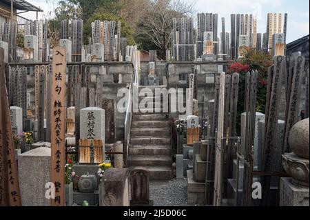 A Japanese grave with Toba, wooden tablets bearing the name of deceased ...