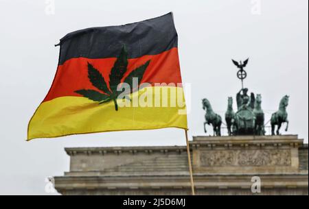Cannabis plant with German flag in the background Stock Photo - Alamy