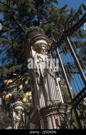 Rome, Italy, gate to the Barberini Palace (Palazzo Barberini) at night ...