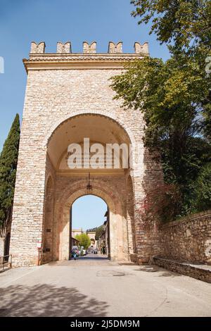 Gate entrance to the town of Assisi, Umbria, Italy. Porta Nuova of ...