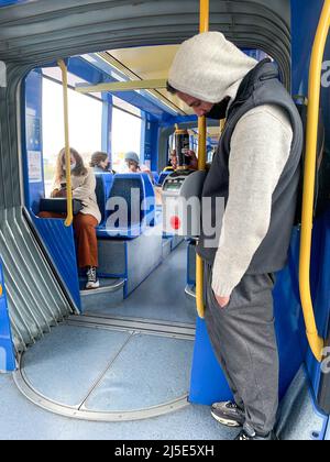 Drunk man standing in a tram train, Lyon, France Stock Photo - Alamy