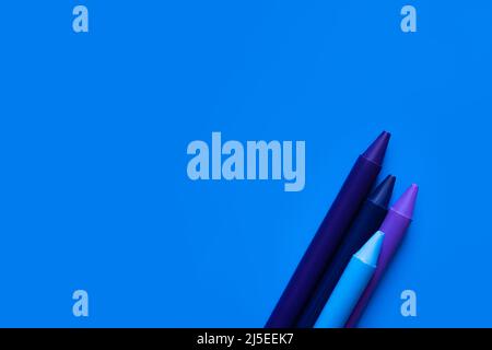 top view of blue gradient crayons on bright background, banner Stock ...