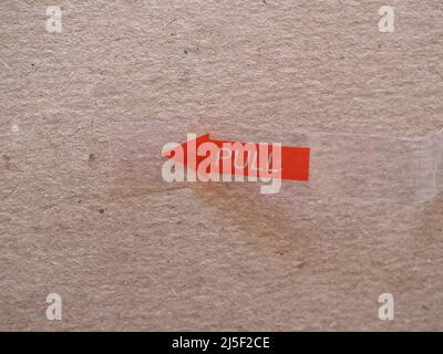 pull label with red arrow indicating direction Stock Photo - Alamy