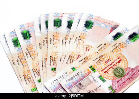 a pile of 100 AED one hundred Dirhams banknote currency of United Arab ...