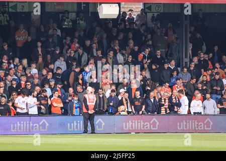 Luton, UK. 23rd Apr, 2022. Gary Madine #14 of Blackpool and Tom Lockyer ...