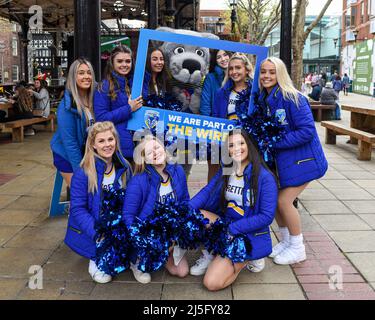 The Warrington Wolves cheerleaders have fun in the fan zone before the ...