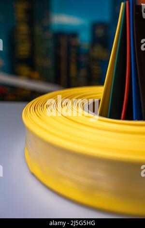 yellow rubber insulation for electrical wires in a roll Stock Photo - Alamy