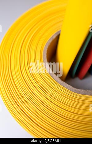 yellow rubber insulation for electrical wires in a roll Stock Photo - Alamy