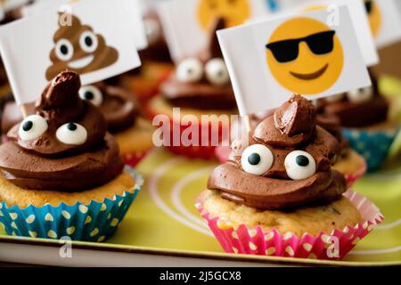 poop emoji cupcakes Stock Photo - Alamy