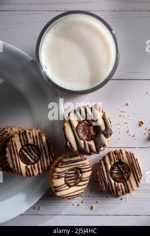 Tasty Stuffed pastry over wooden background Stock Photo - Alamy