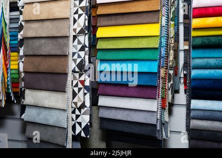 A set of fabric samples for furniture finishing. Multicolored ...